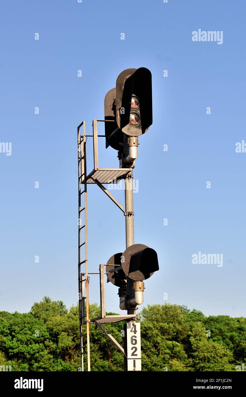 Kaneland, Illinois, USA. Railroad signals control traffic on a double ...