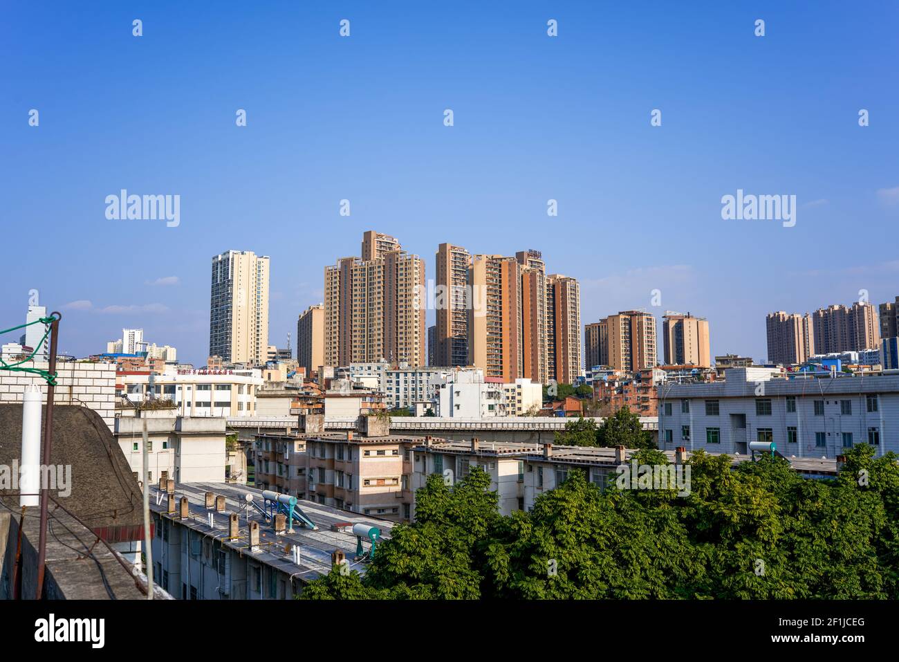 Urban high-rise housing complex and green landscape Stock Photo - Alamy