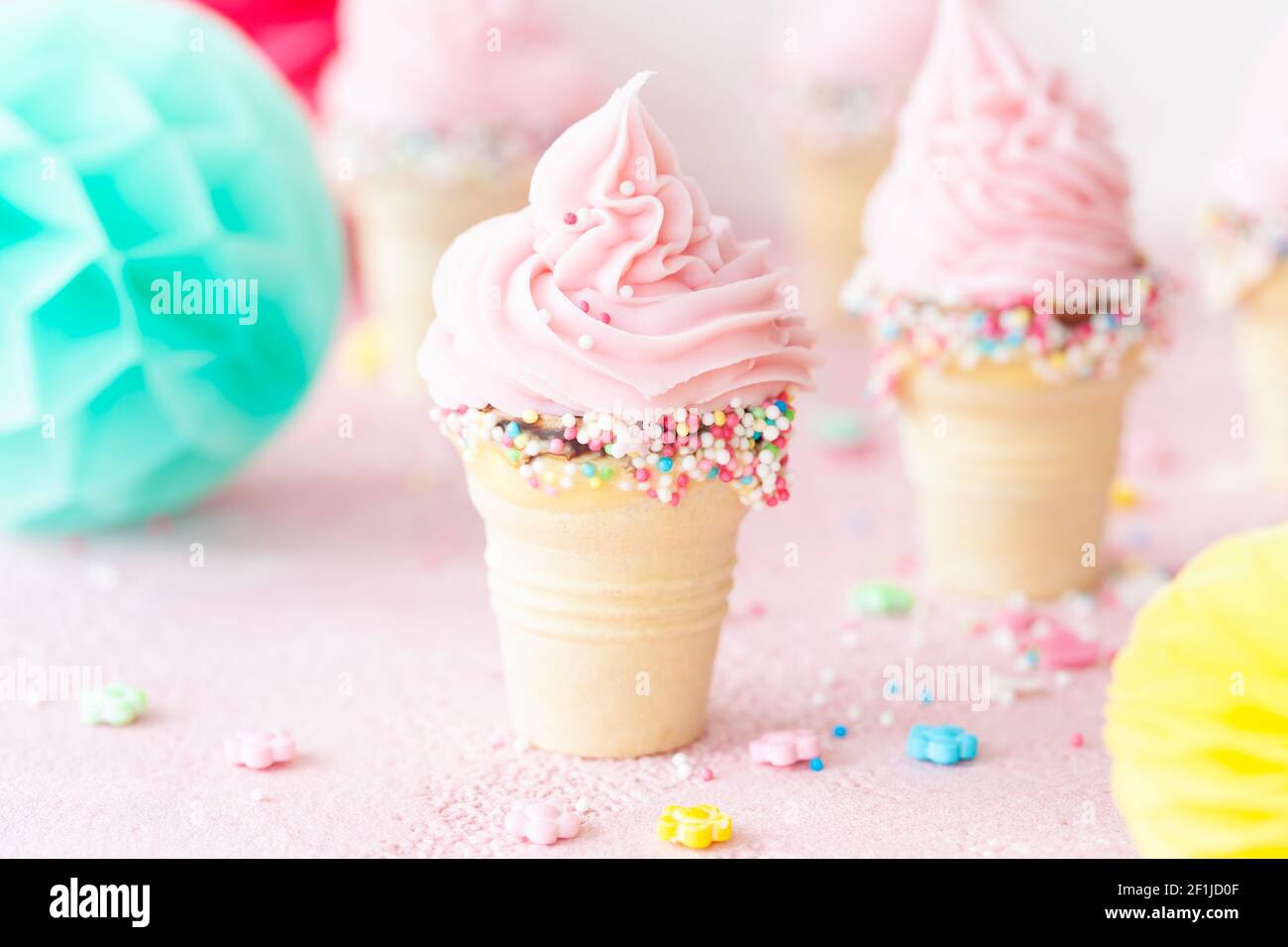Pink soft ice cream in small cups Stock Photo - Alamy