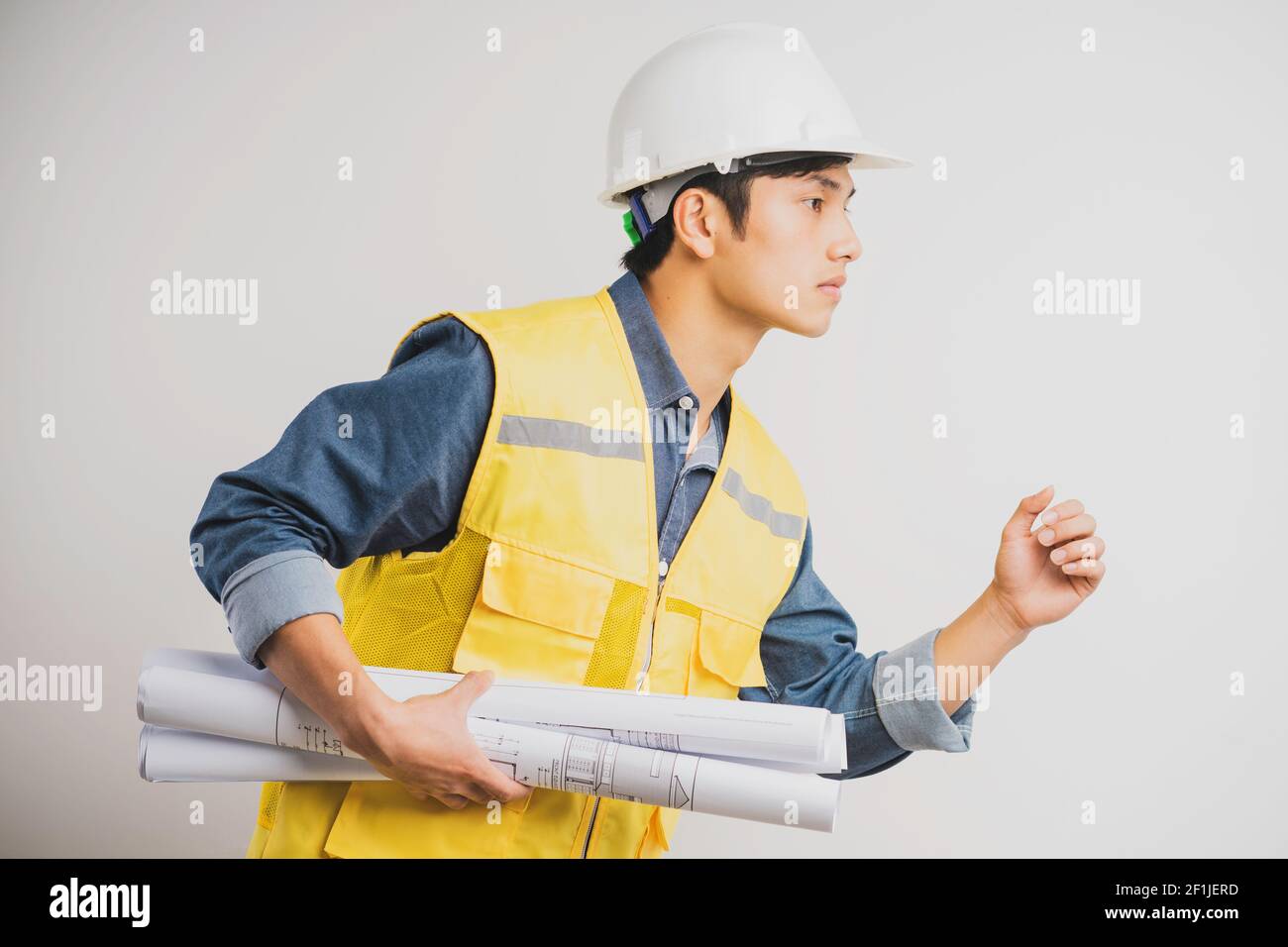 Indonesian asian builder construction hi-res stock photography and ...