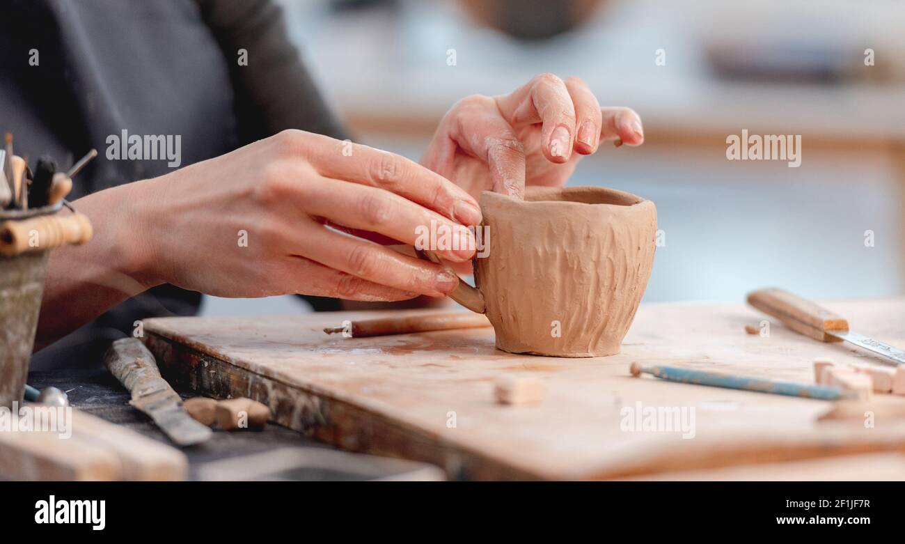 Clay forming process hands hi-res stock photography and images - Alamy