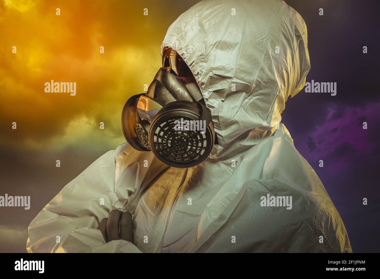 Virus infection concept. Man in protective suit and antigas mask with ...