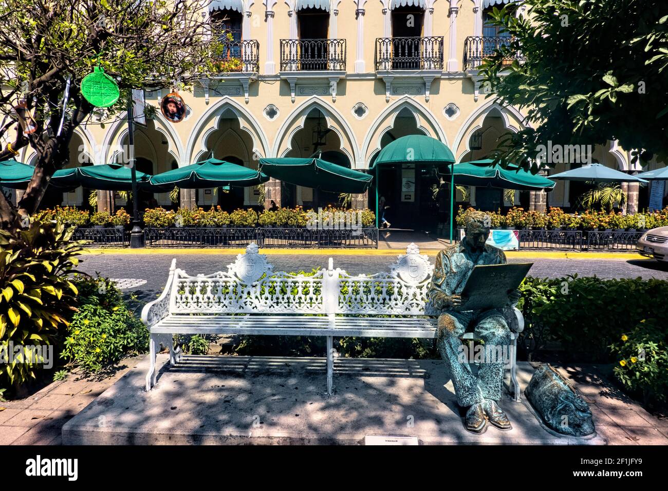 The charming Plaza Colima and Juan Rulfa statue, Colima, Mexico Stock ...