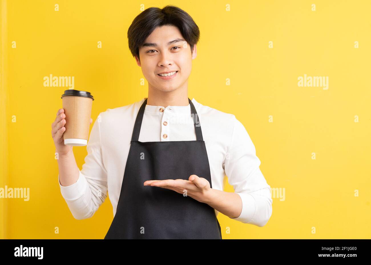Asian waiter holding paper hi-res stock photography and images - Alamy