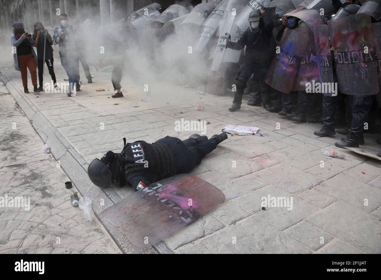 A riot police wounded during the riots caused for the protests against ...