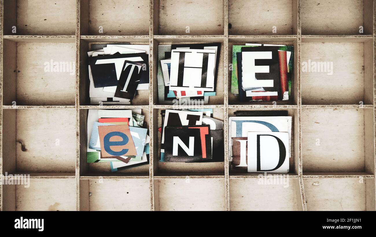 The End with magazine letters in a wooden box Stock Photo - Alamy