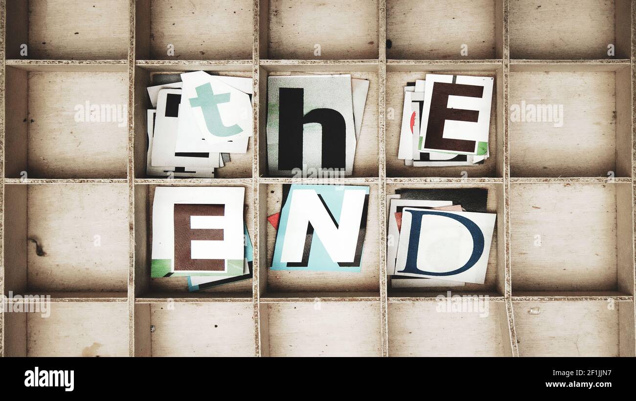 The End with magazine letters in a wooden box Stock Photo - Alamy