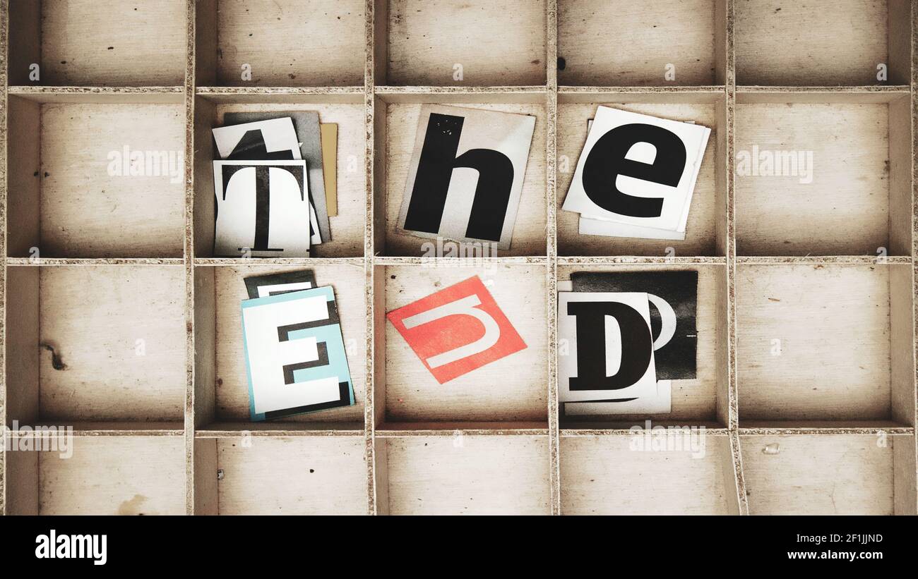 The End with magazine letters in a wooden box Stock Photo - Alamy
