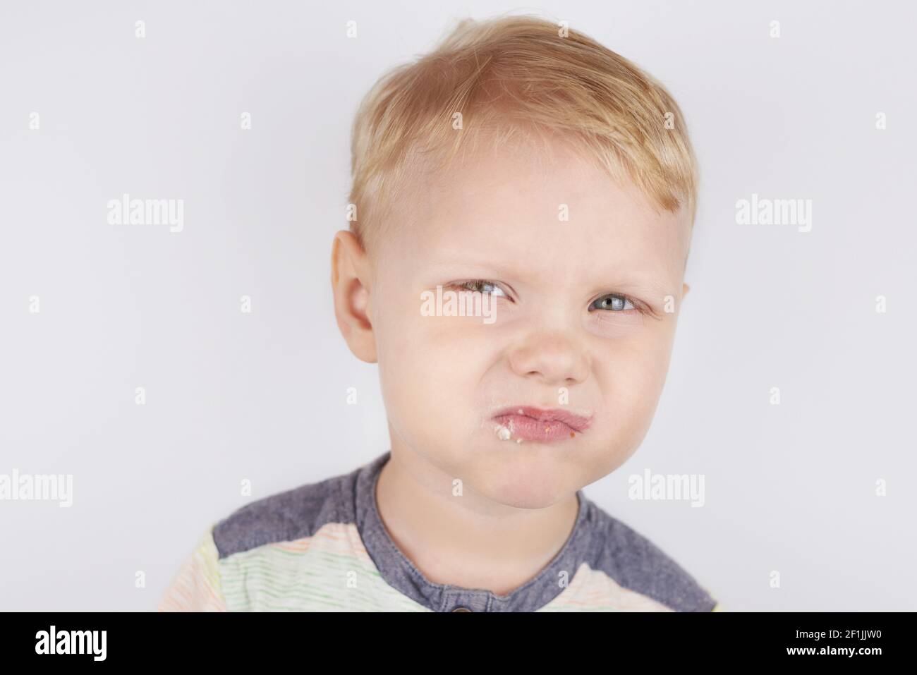 Boy with crumbs on his face hi-res stock photography and images - Alamy
