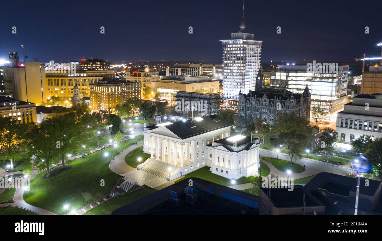 Downtown street scene at dawn with lights hi-res stock photography and ...