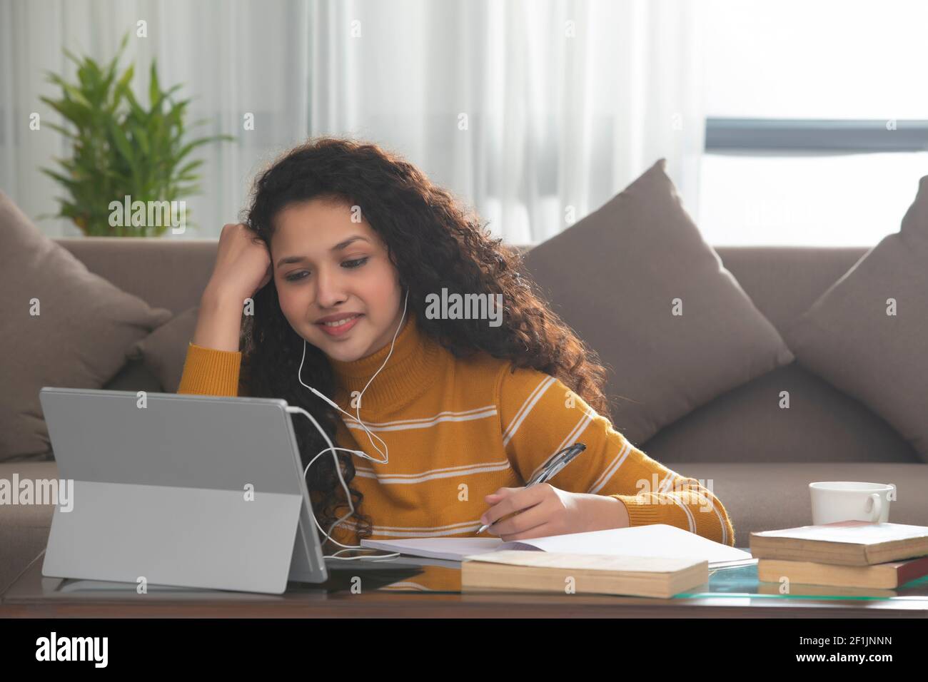 Student attending class with tablet hi-res stock photography and images ...