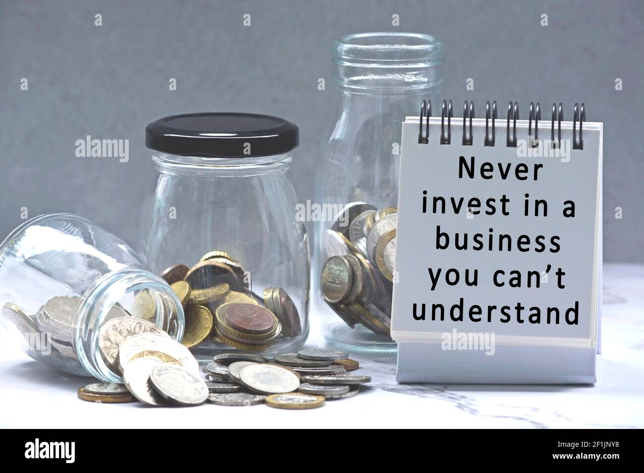 Coins in jar new hi-res stock photography and images - Alamy