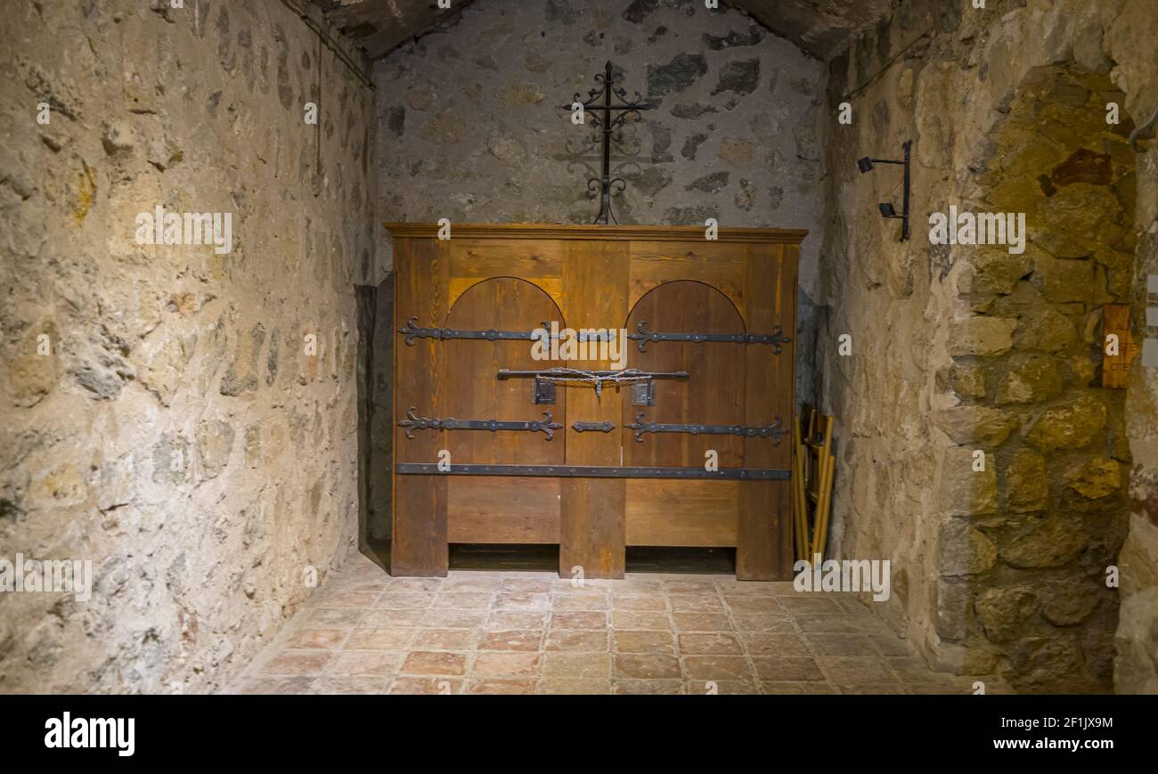 Interior of a medieval castle in Toledo, Spain. Stone rooms with wooden ...