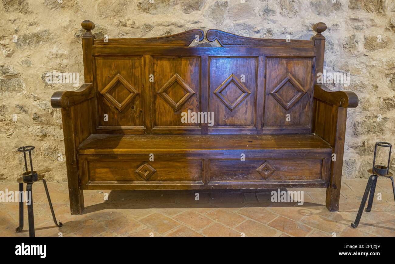 Wooden seats, Interior of a medieval castle in Toledo, Spain. Stone ...