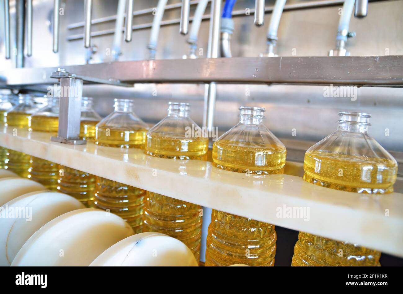 Sunflower oil. Factory line of production and filling of refined oil ...