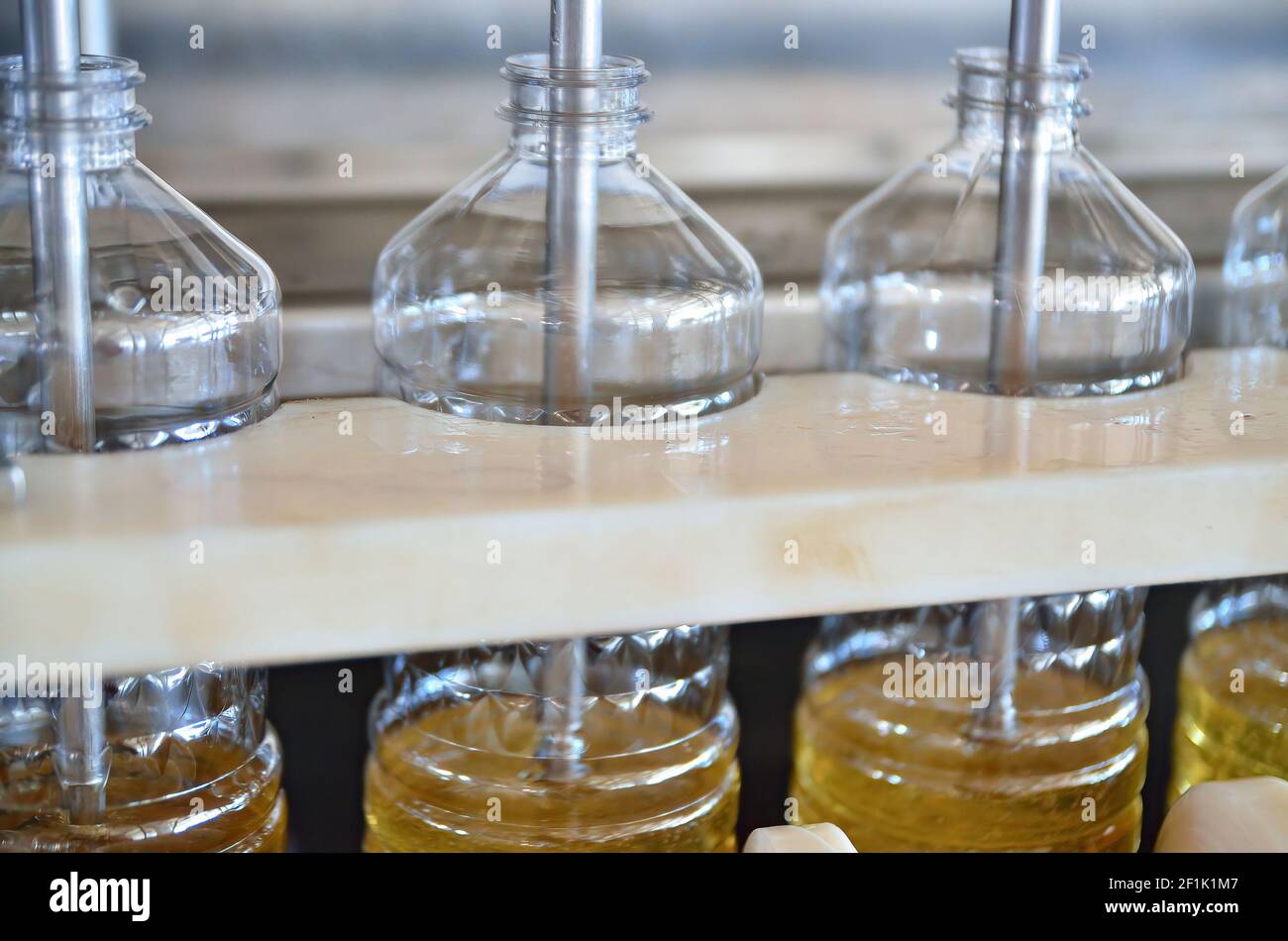 Sunflower oil. Factory line of production and filling of refined oil ...