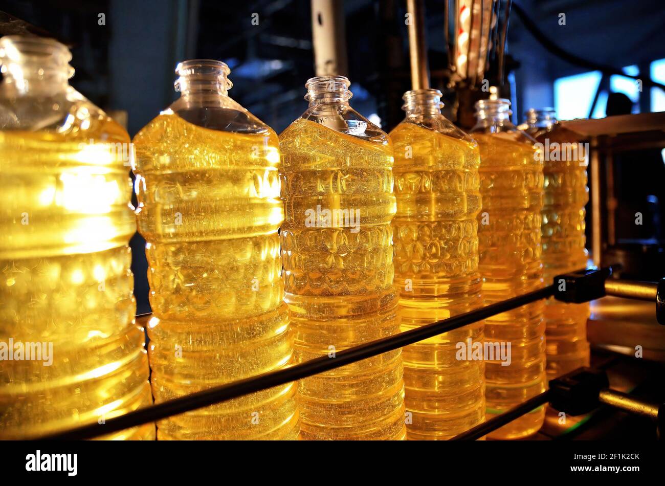 Sunflower oil. Factory line of production and filling of refined oil ...