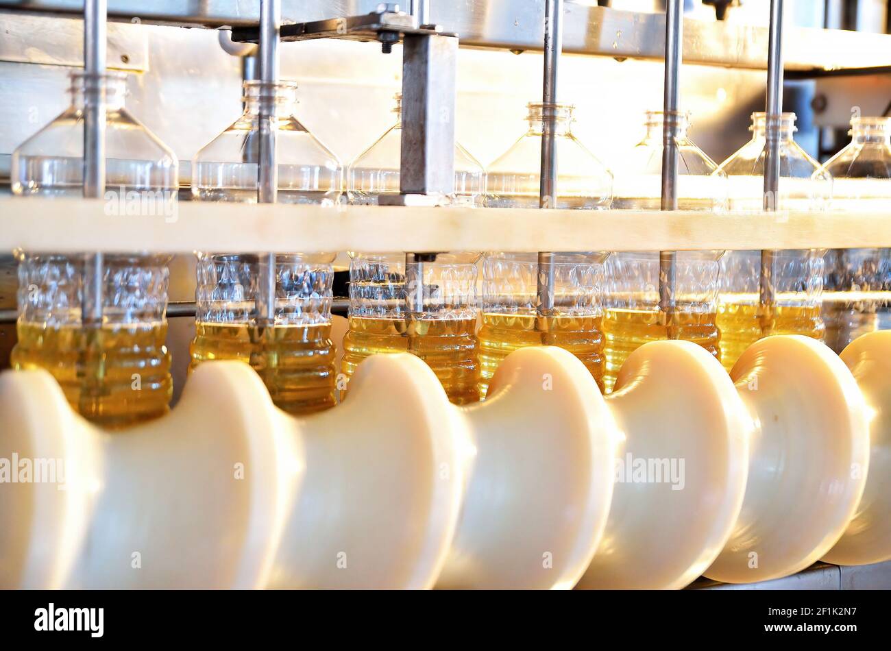 Sunflower oil. Factory line of production and filling of refined oil ...