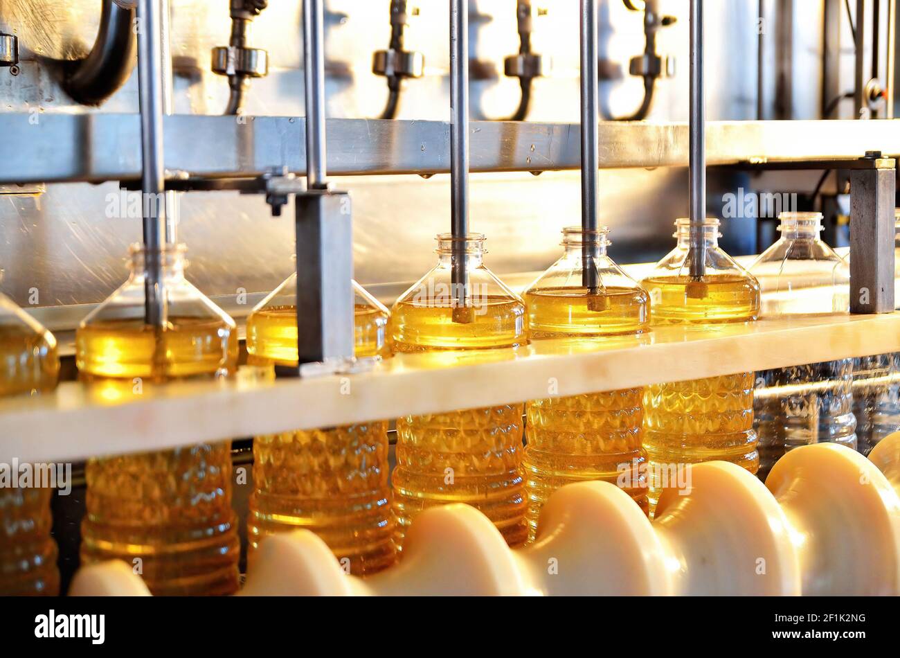 Sunflower oil. Factory line of production and filling of refined oil ...
