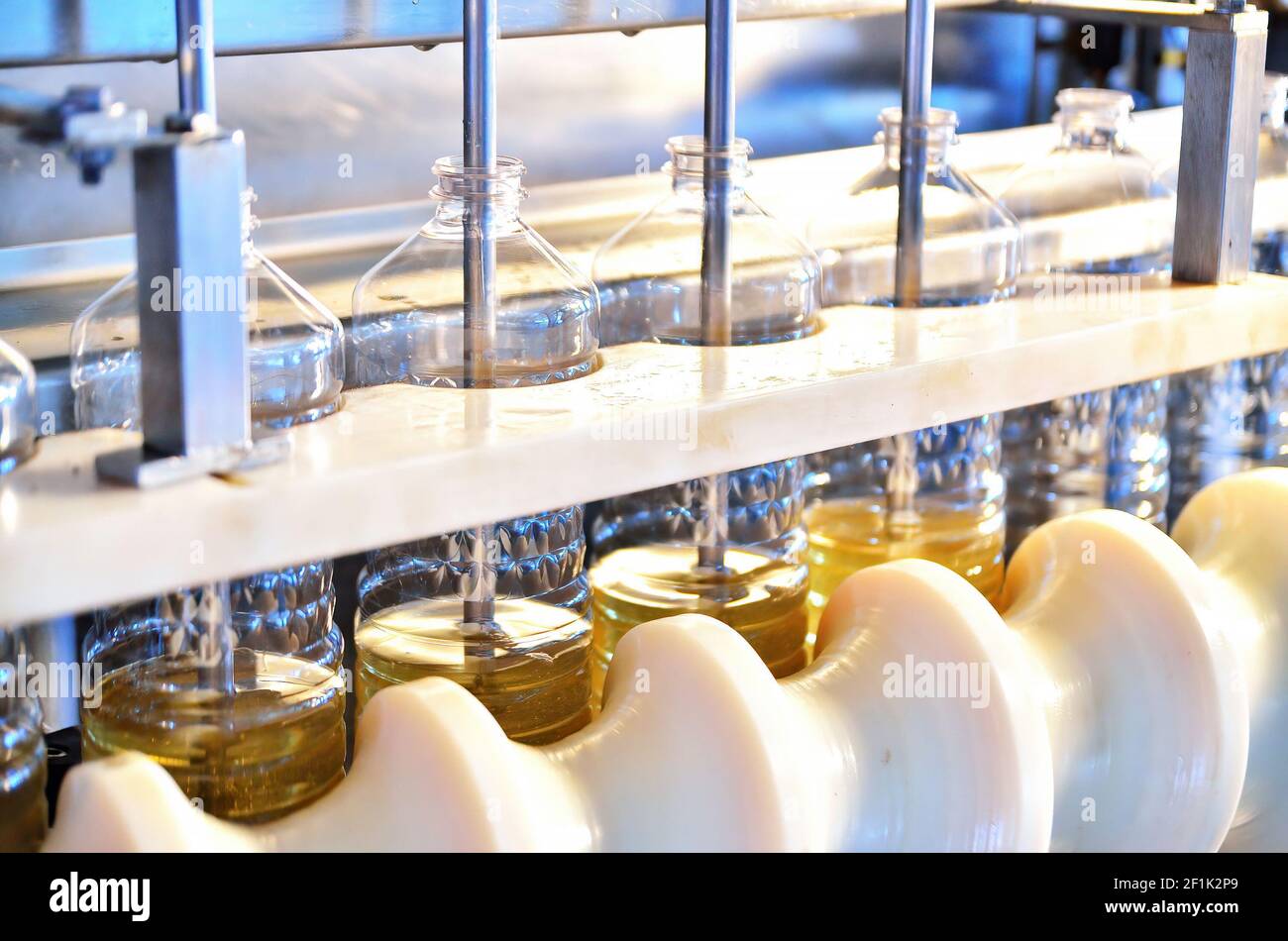 Sunflower oil. Factory line of production and filling of refined oil ...