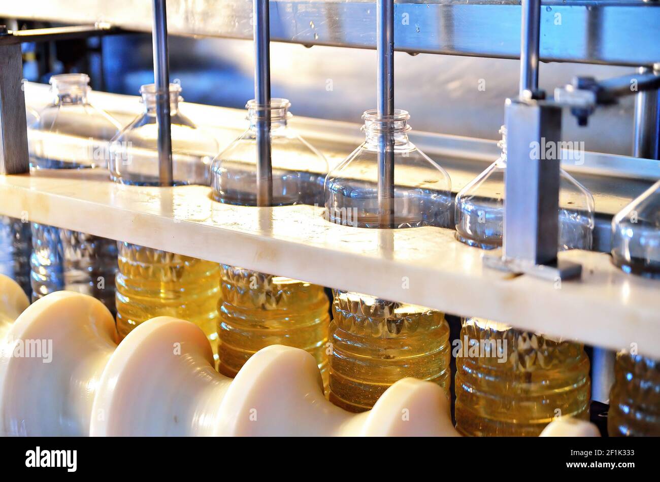 Sunflower oil. Factory line of production and filling of refined oil ...