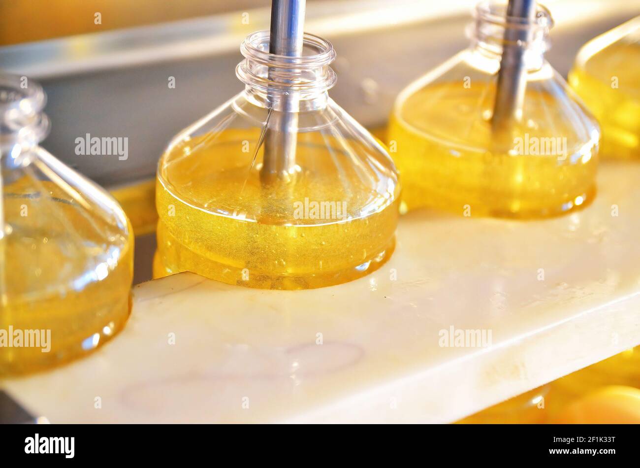 Sunflower oil. Factory line of production and filling of refined oil ...