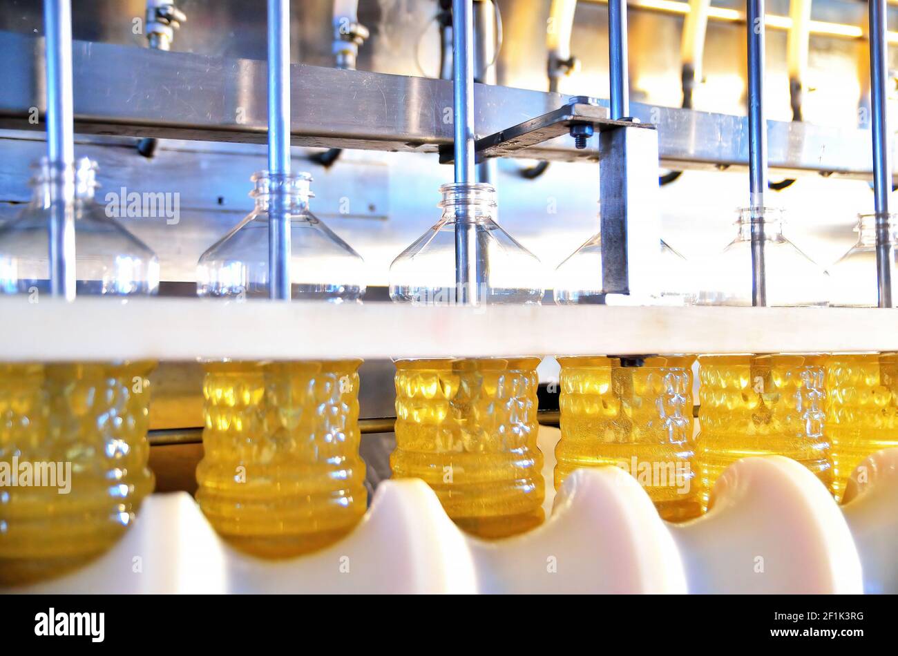 Sunflower oil. Factory line of production and filling of refined oil ...