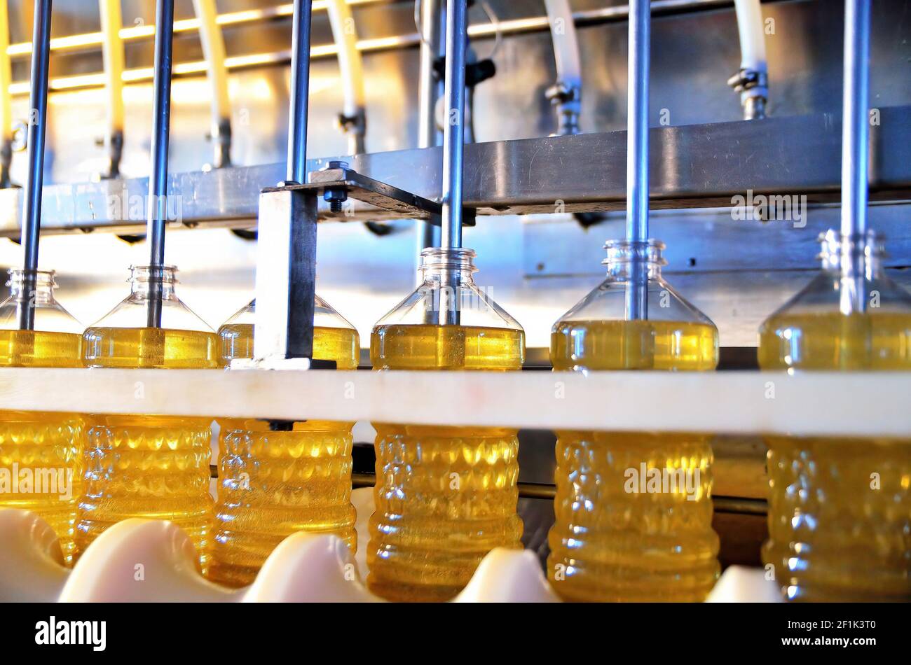 Sunflower oil. Factory line of production and filling of refined oil ...