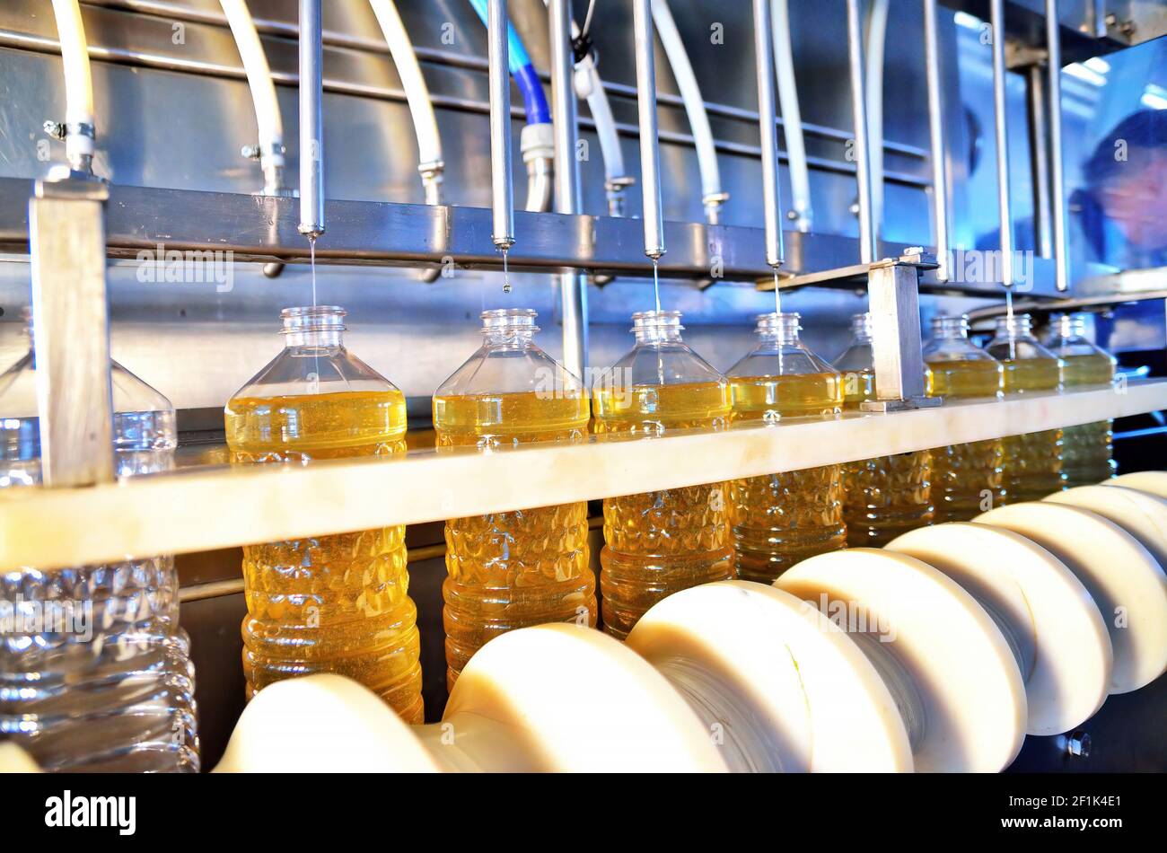 Sunflower oil. Factory line of production and filling of refined oil ...