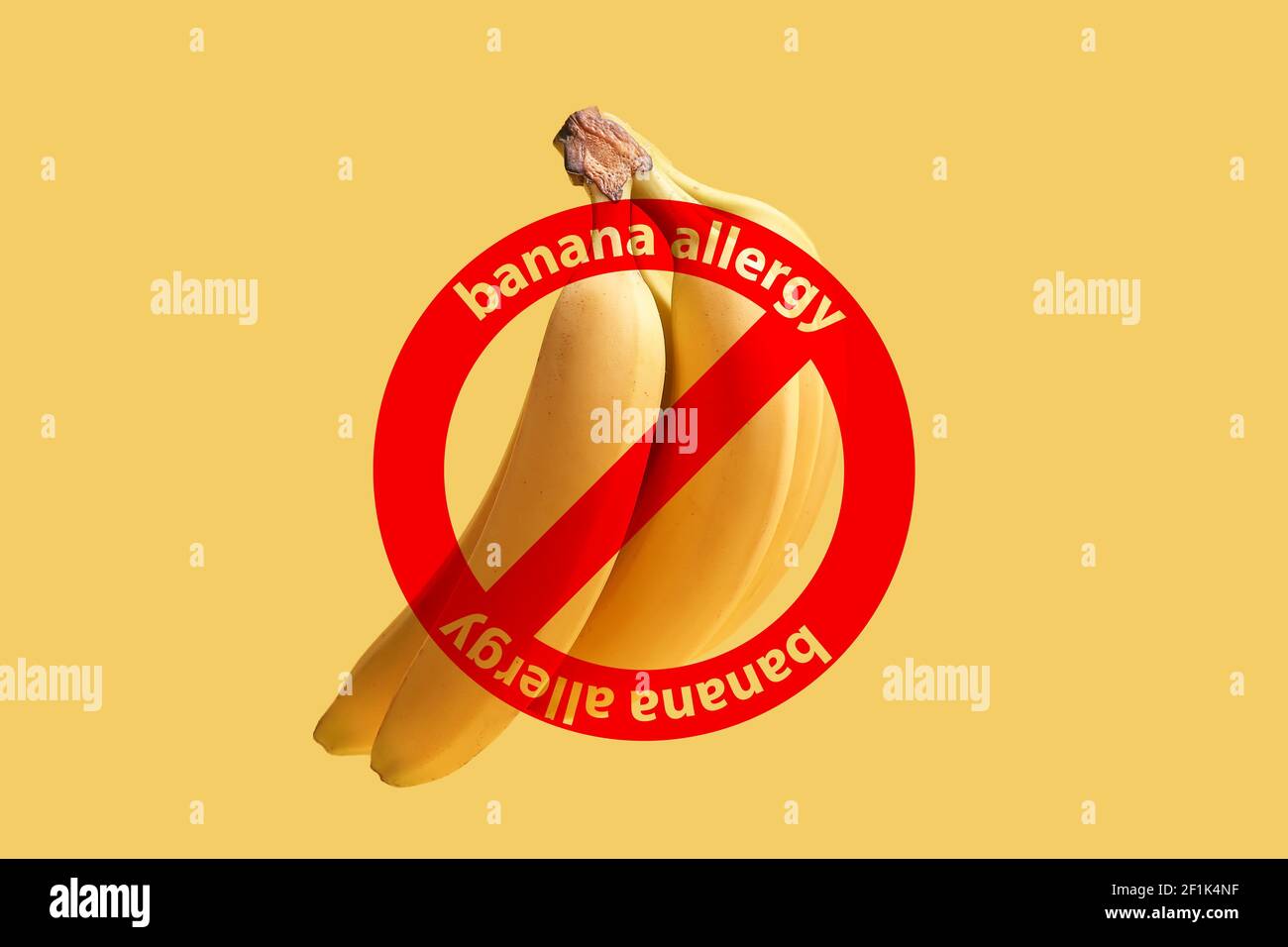 Stop sign and ripe bananas on color background. Food allergy concept ...