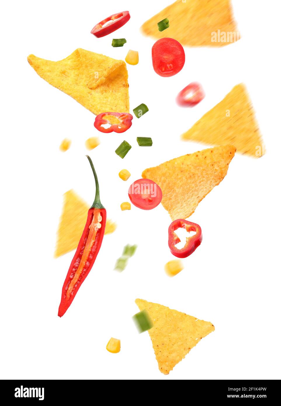 Flying nachos with ingredients on white background Stock Photo - Alamy