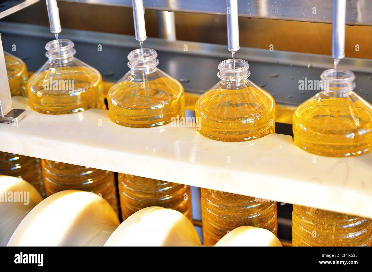 Sunflower oil. Factory line of production and filling of refined oil ...