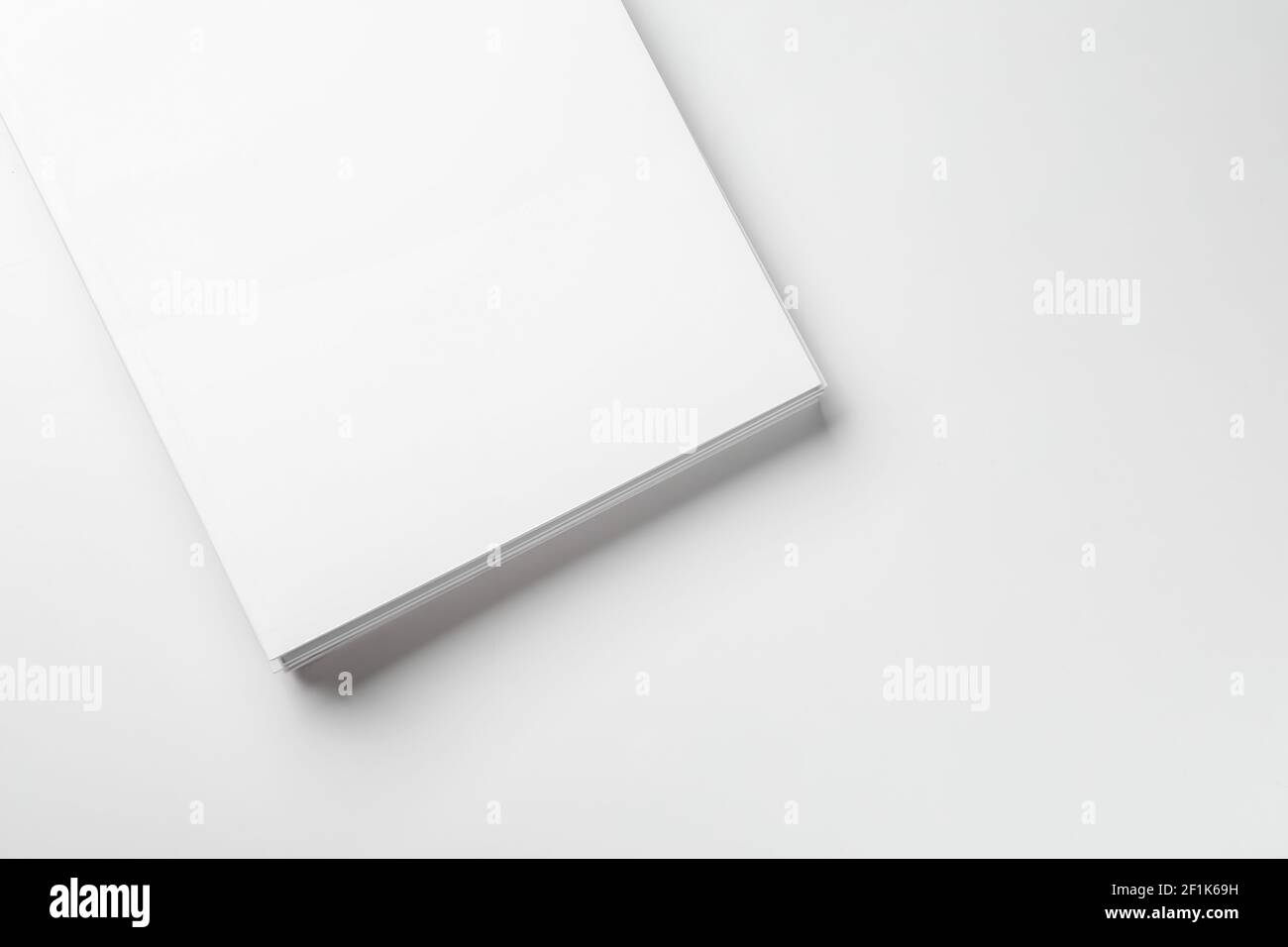 Blank magazine on white background Stock Photo - Alamy
