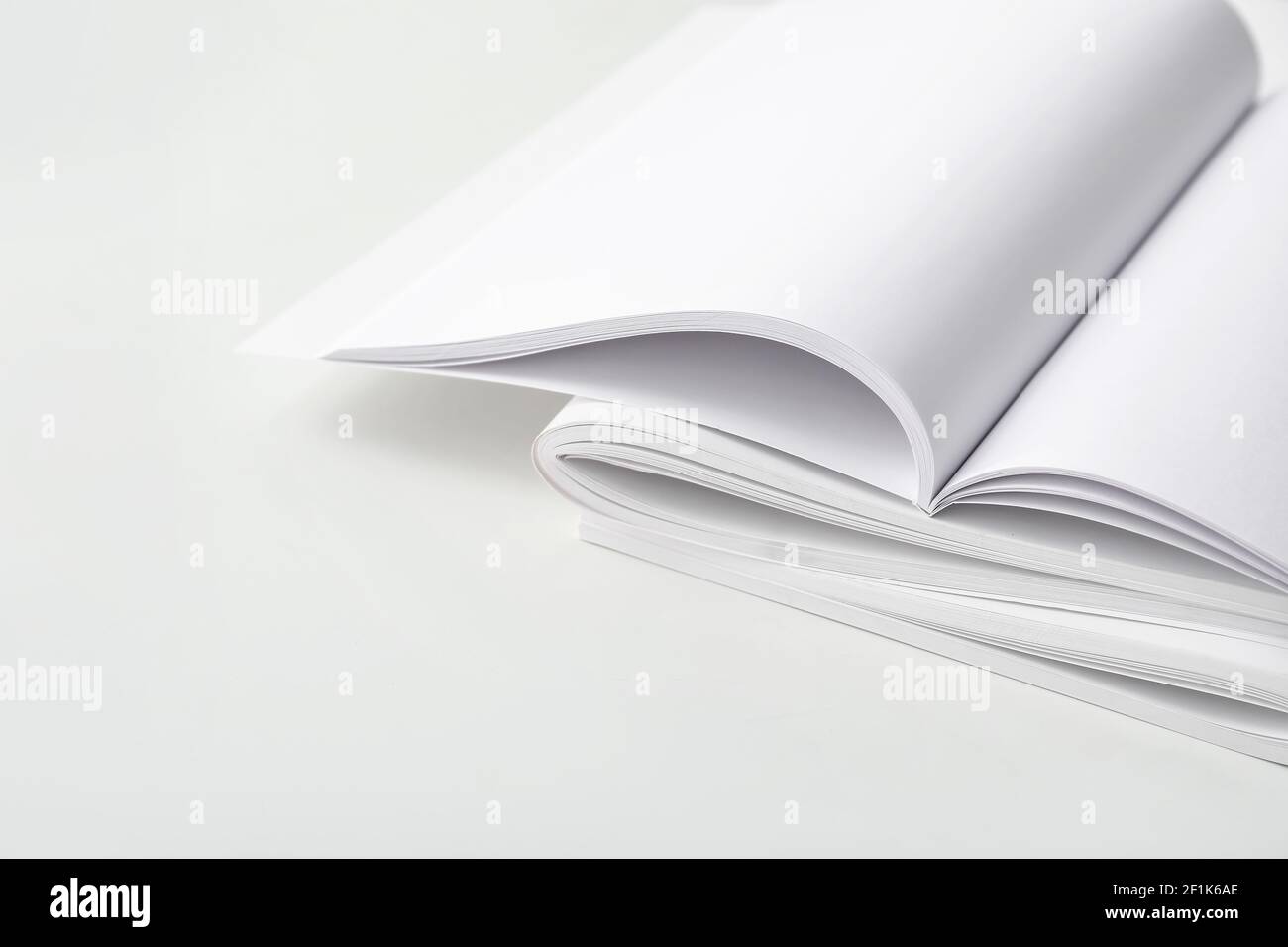 Stack blank magazines on table hi-res stock photography and images - Alamy