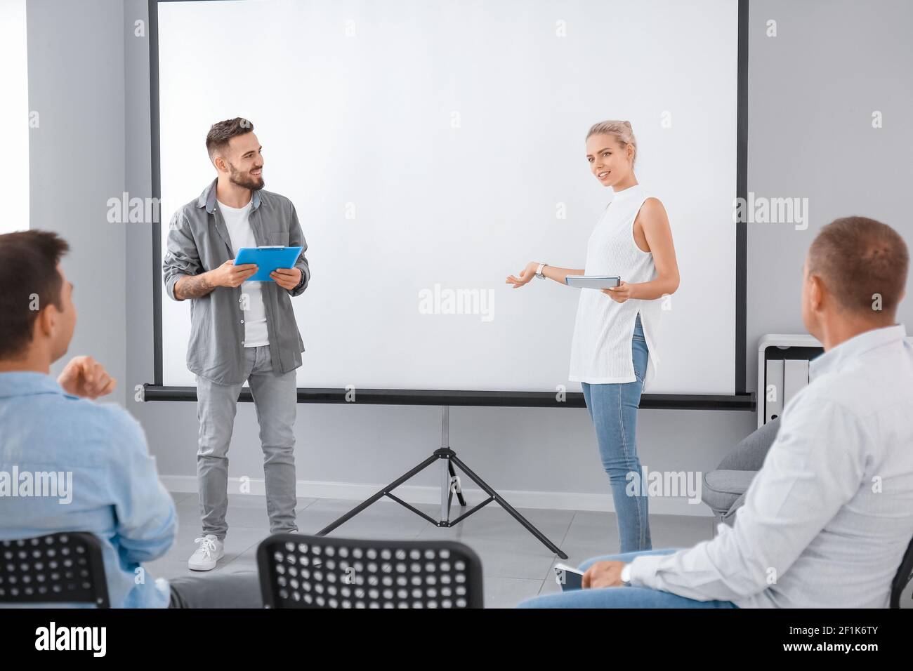 Business people giving presentation during meeting in office Stock ...