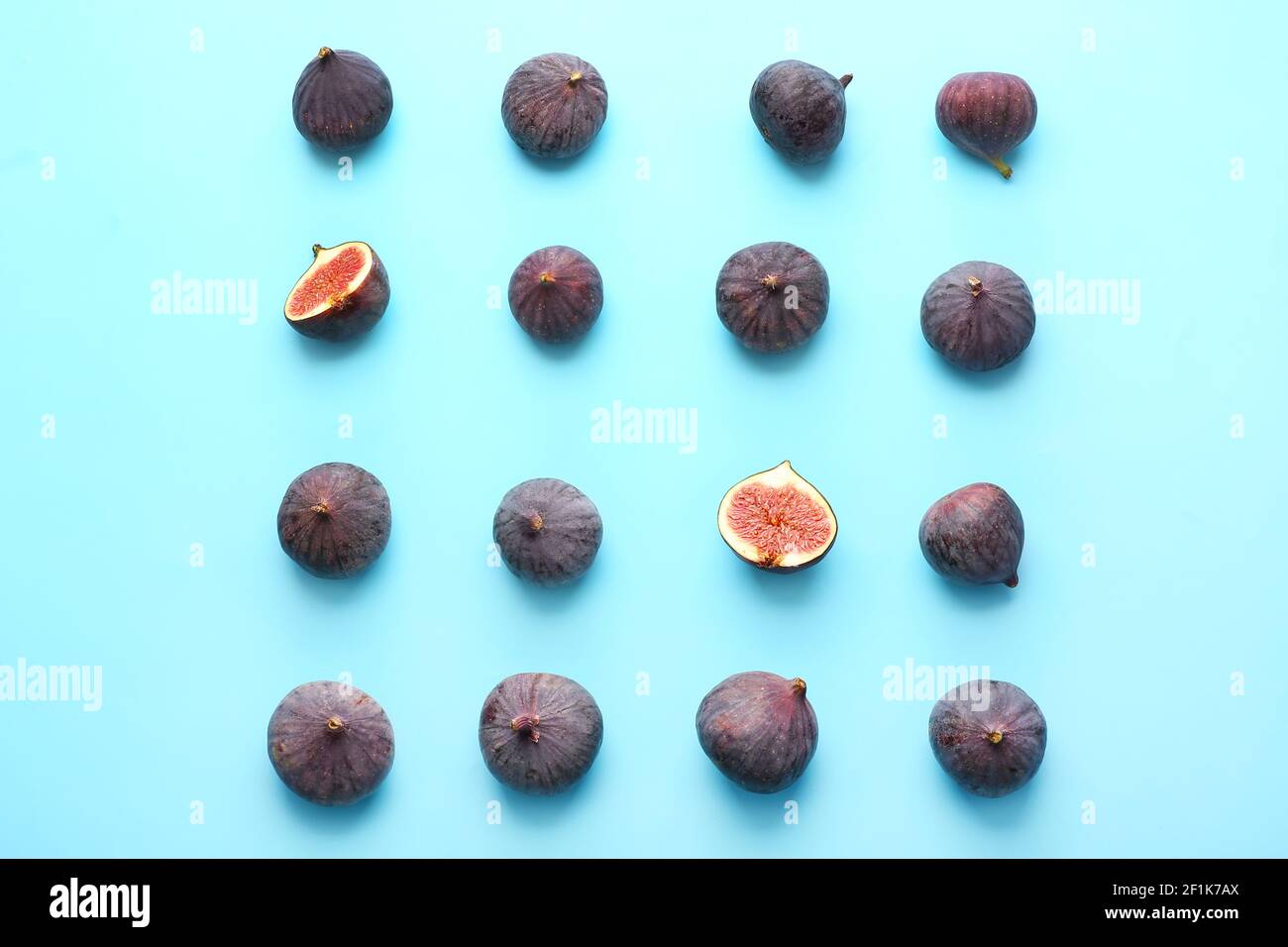 Composition with fresh figs on color background Stock Photo - Alamy