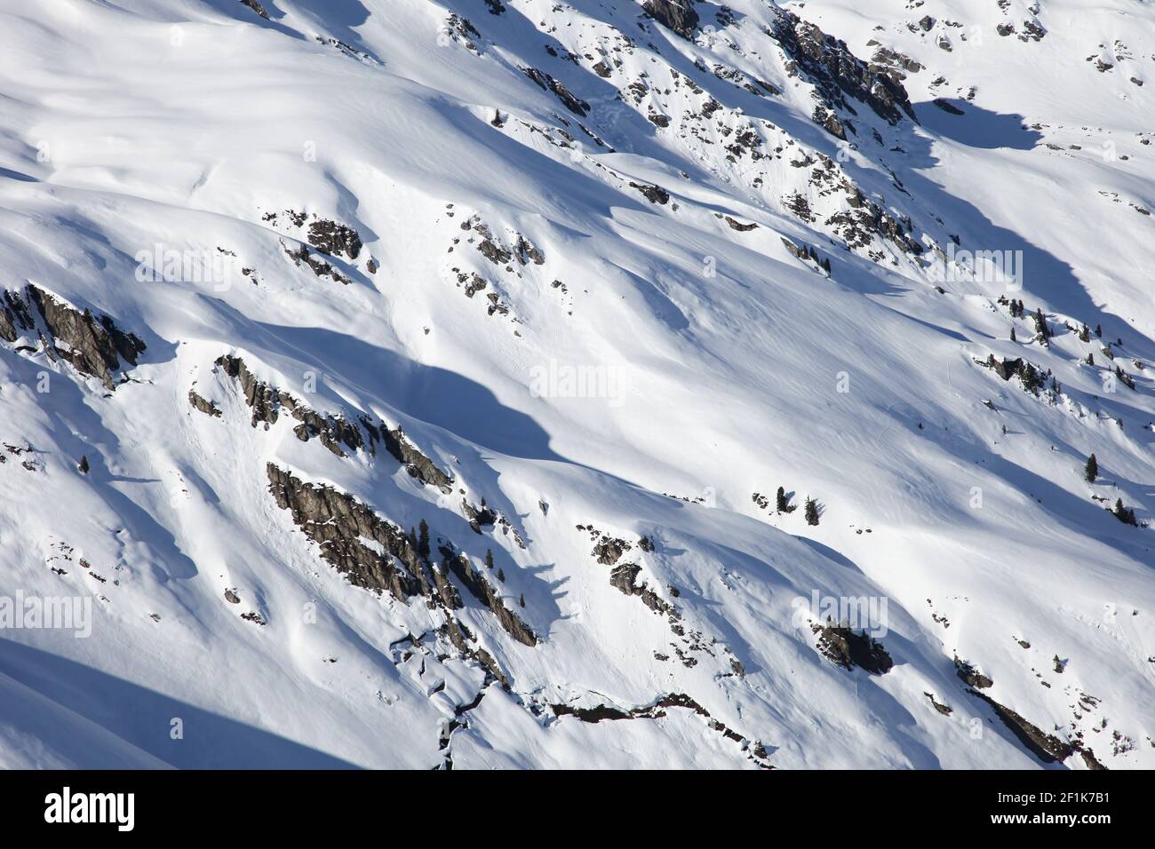 Snow on a rock Stock Photo - Alamy