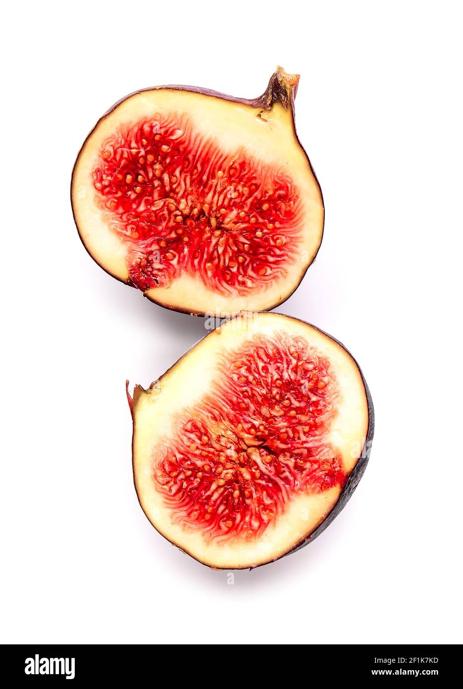 Fresh cut figs on white background Stock Photo - Alamy