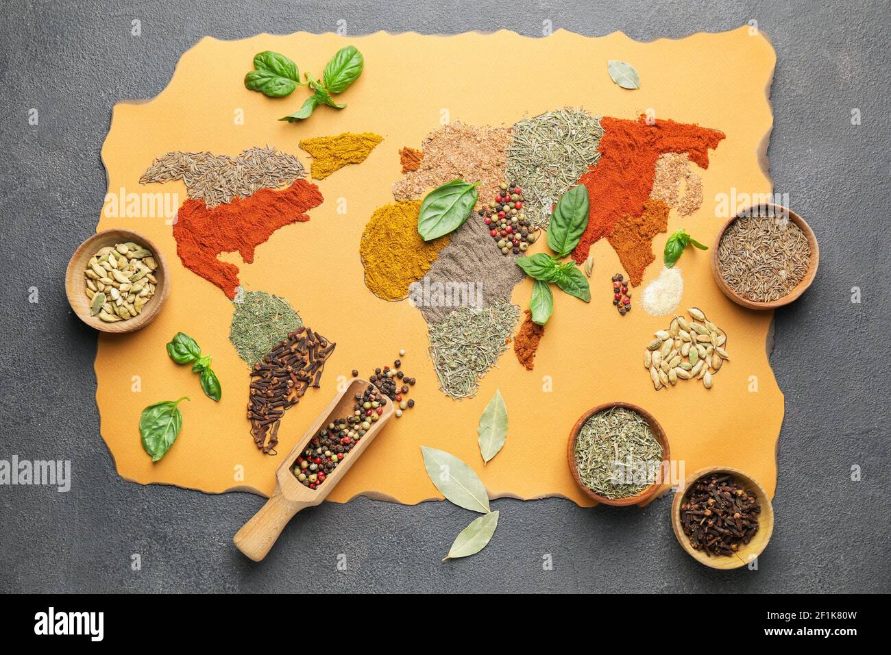 World map made of spices on dark background Stock Photo - Alamy
