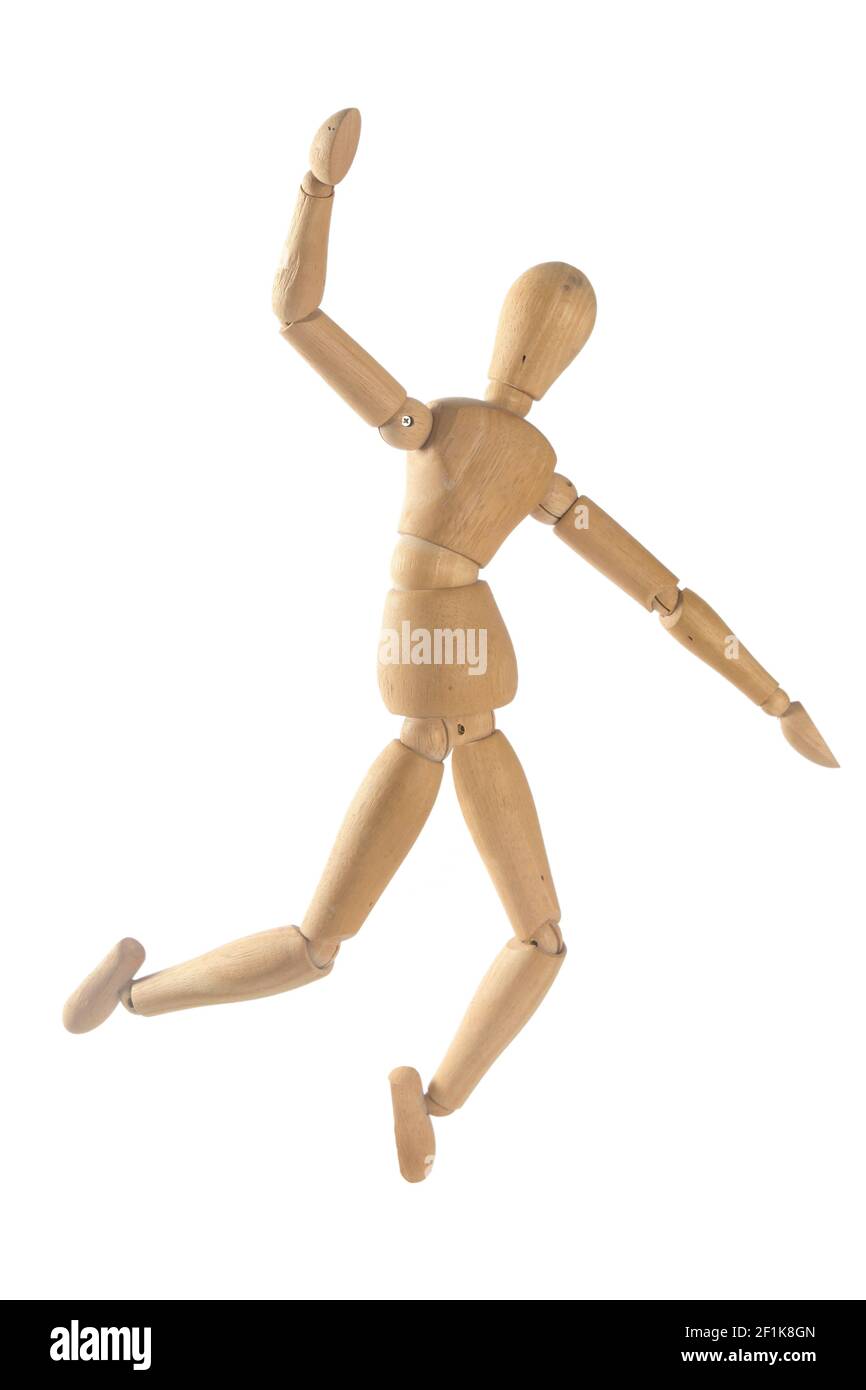 Wooden doll, jumps, falls Stock Photo - Alamy