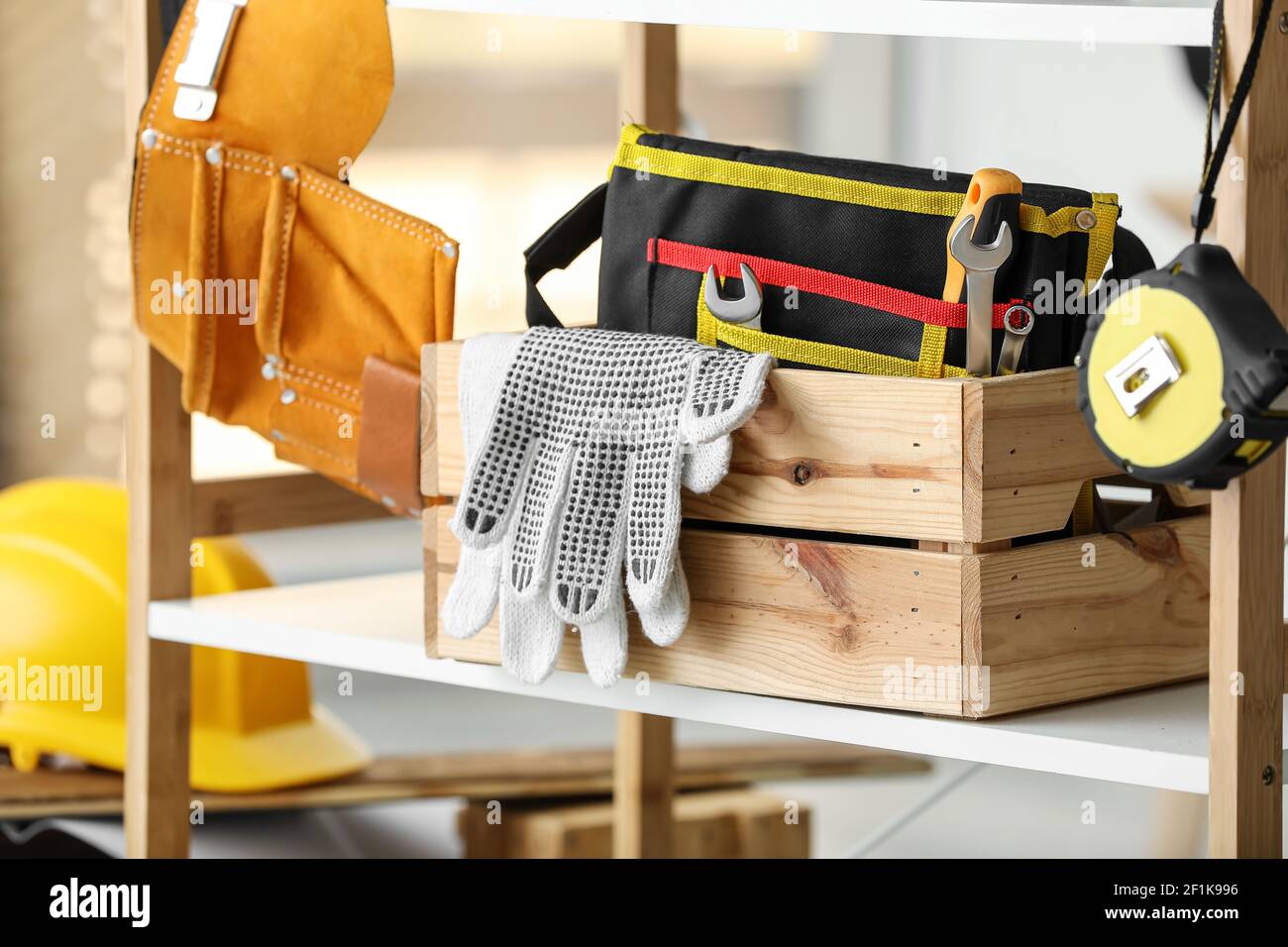 Box with different construction tools in workshop Stock Photo - Alamy