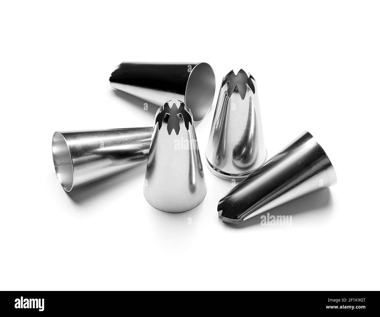 Different piping tips on white background Stock Photo - Alamy
