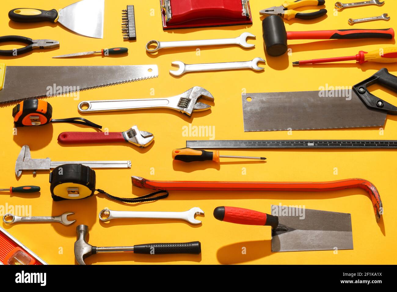 Set of construction tools on color background Stock Photo - Alamy