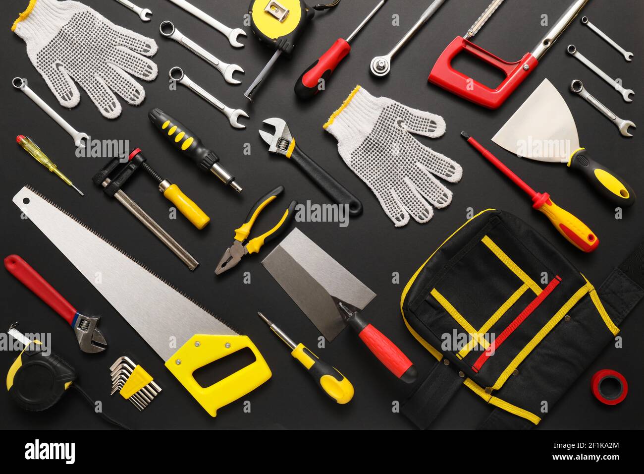 Set of construction tools on dark background Stock Photo - Alamy