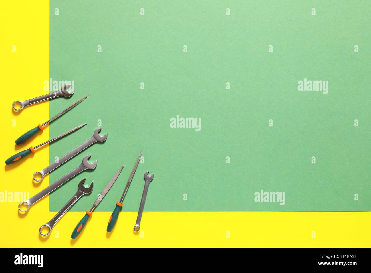Set of construction tools on colorful background Stock Photo - Alamy