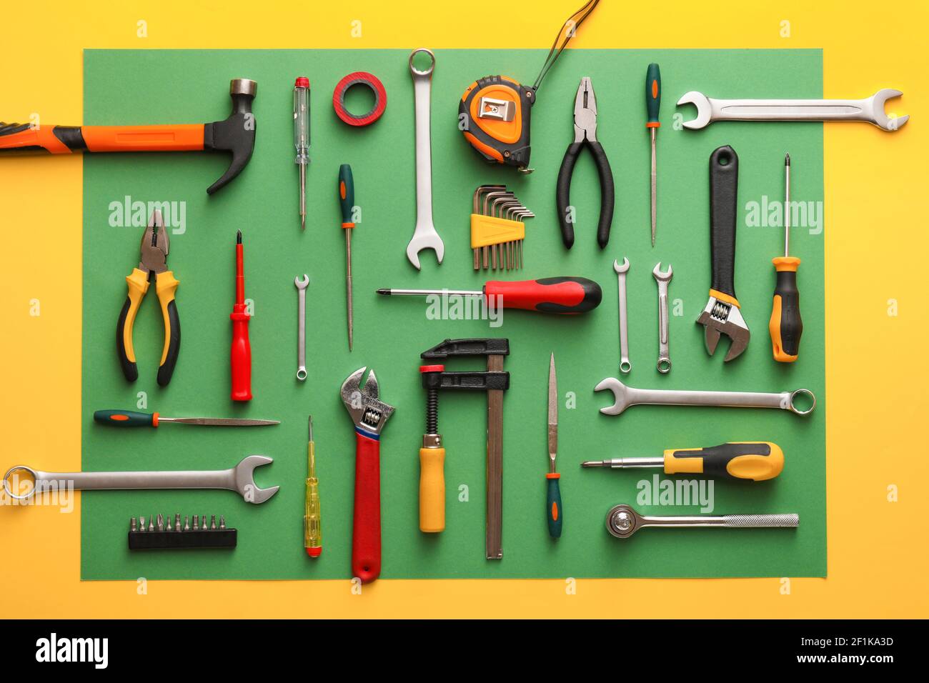 Set of construction tools on colorful background Stock Photo - Alamy