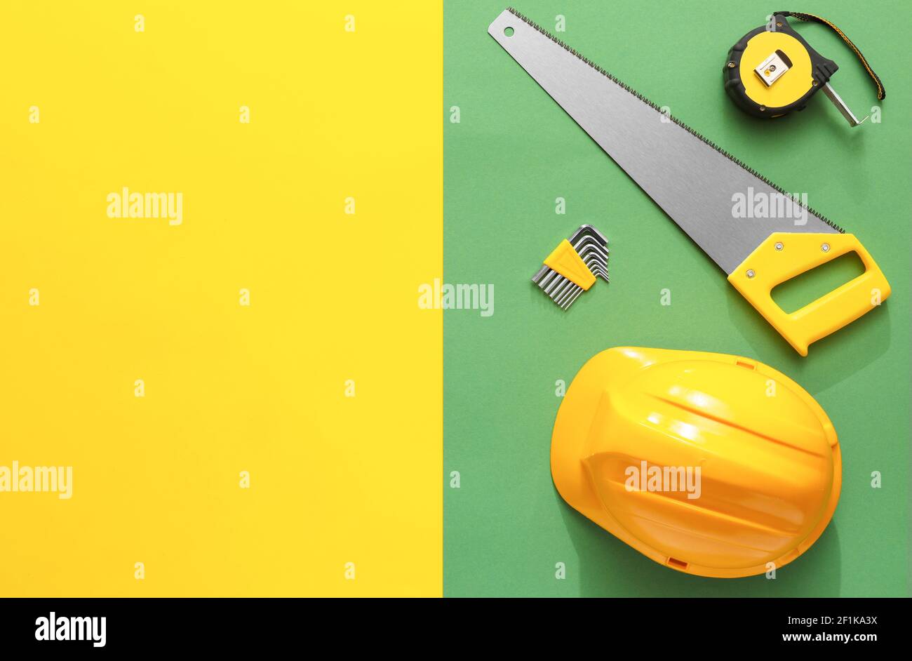 Set of construction tools on colorful background Stock Photo - Alamy