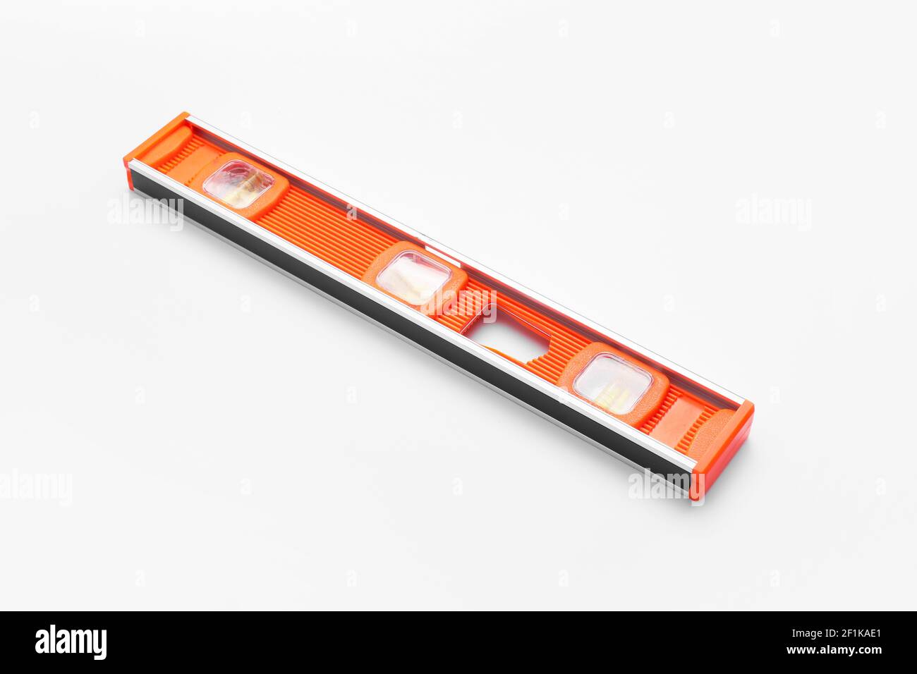 Spirit level on white background Stock Photo - Alamy