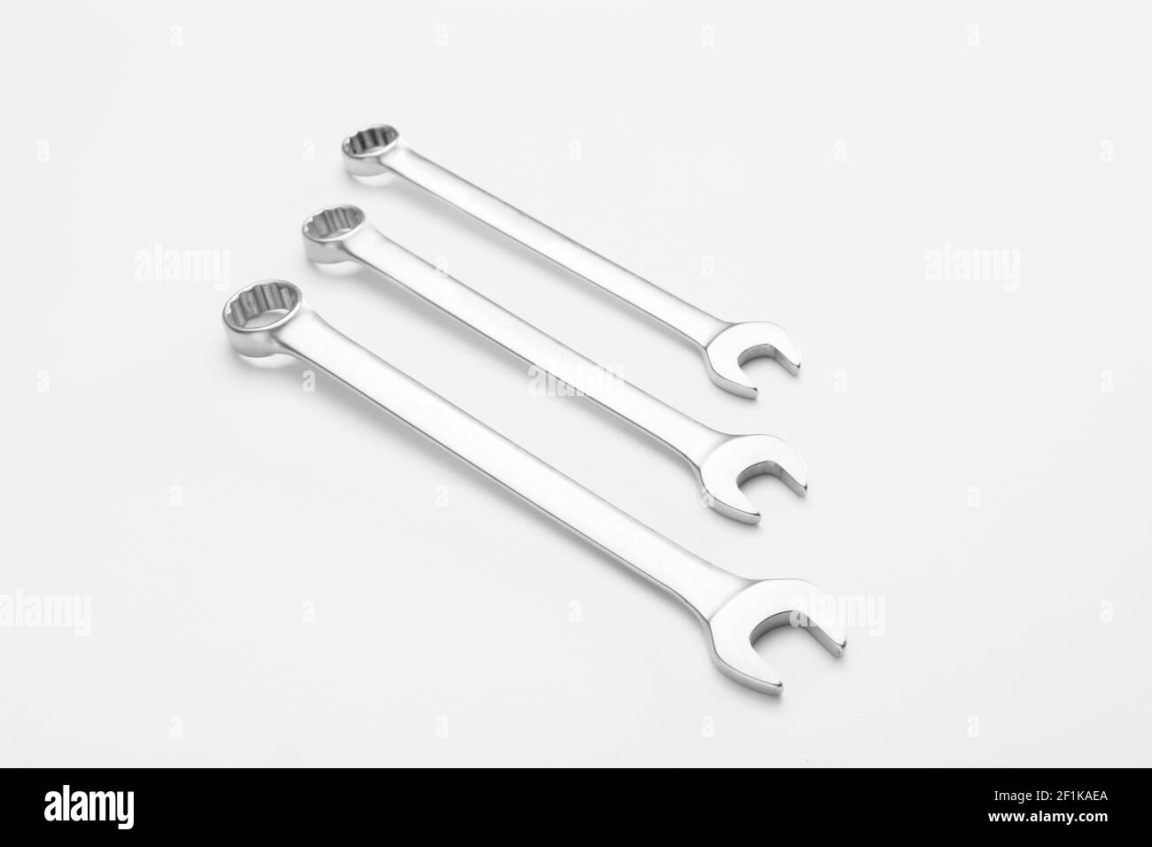 Metal wrenches on white background Stock Photo - Alamy
