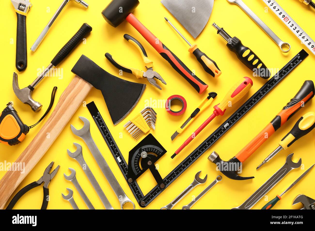Set of construction tools on color background Stock Photo - Alamy